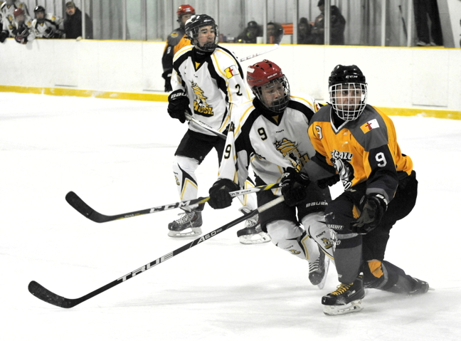 Photo: Keep your eyes on the puck | Nunatsiaq News